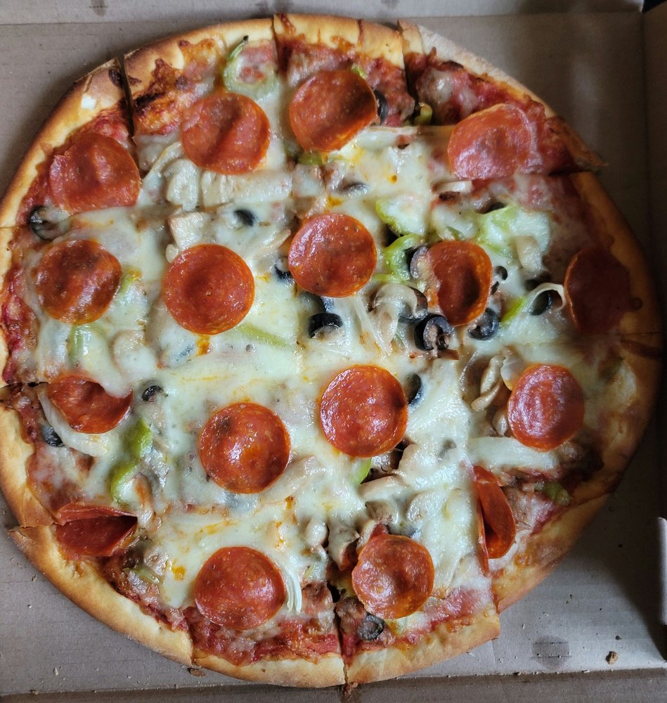 Rico Rino's Pizza, Harvey | Roadtrippers