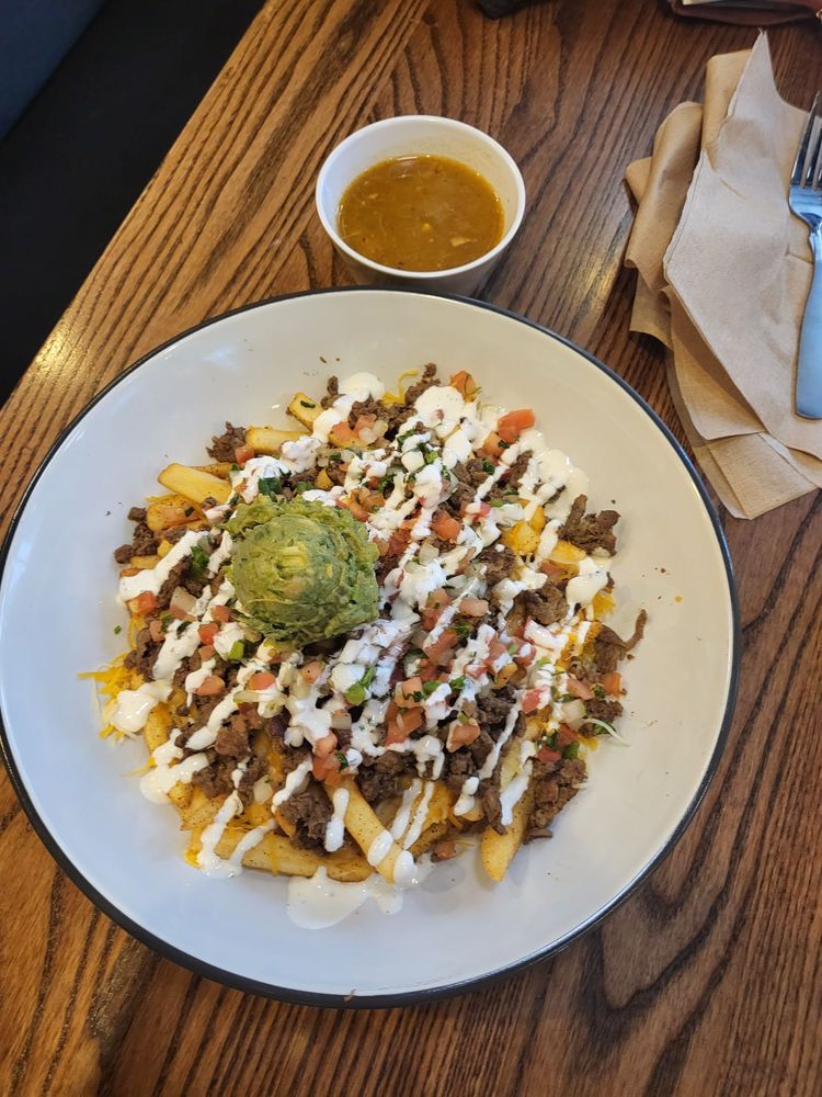 Que Rico, Denver | Roadtrippers